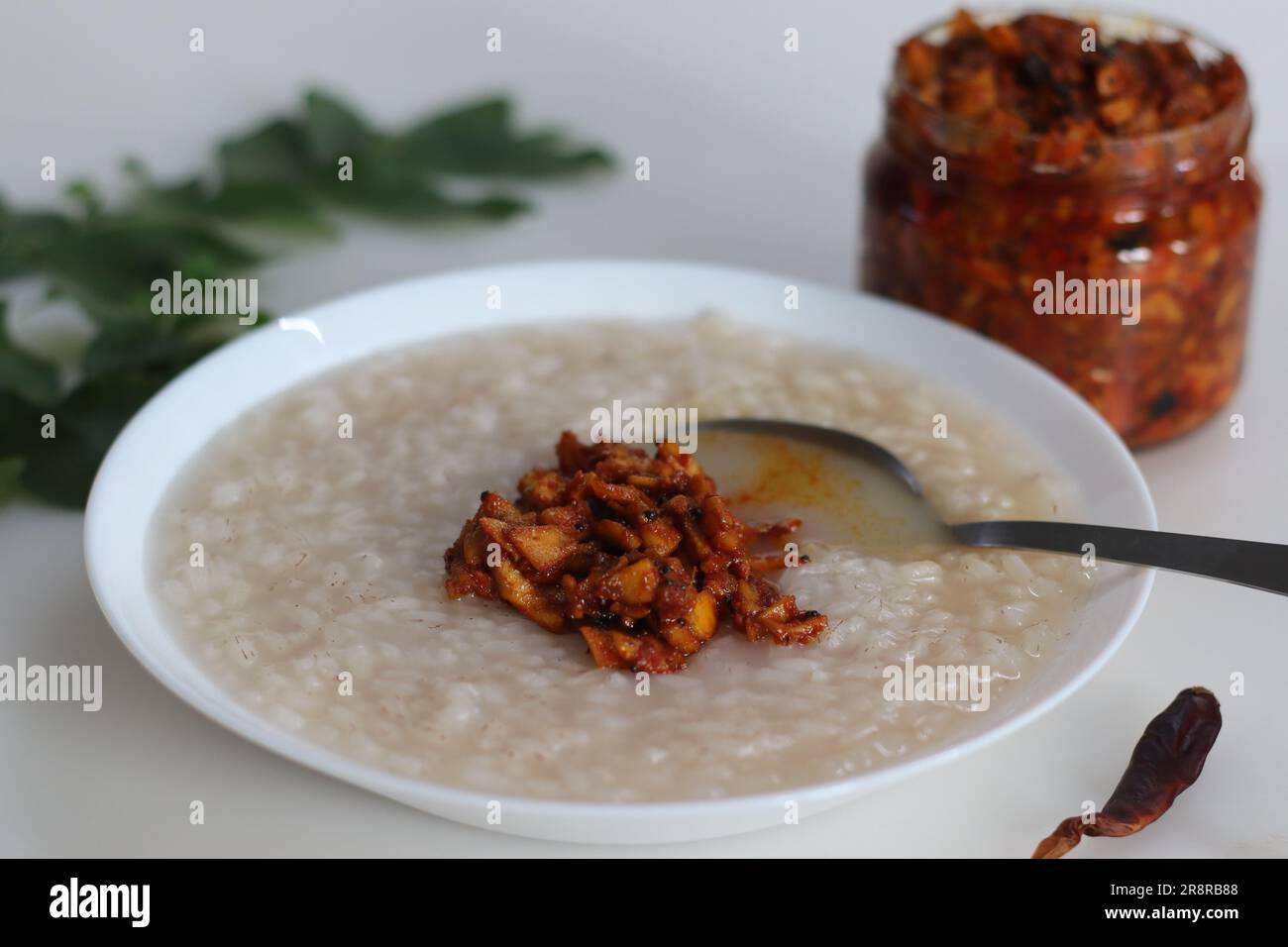 Kanji and Kadumanga. Rice gruel prepared with Kerala Matta rice. Served ...