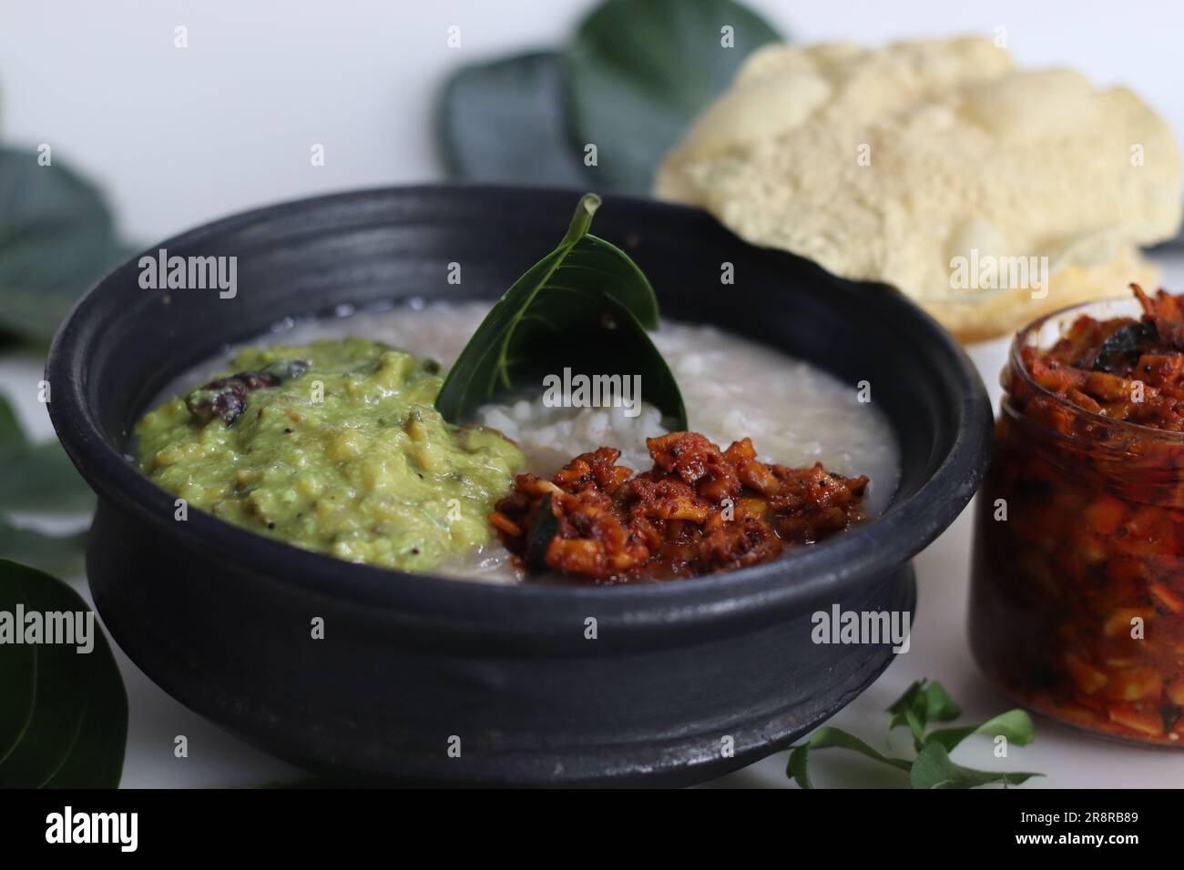Kanji and Kadumanga. Rice gruel prepared with Kerala Matta rice. Served ...