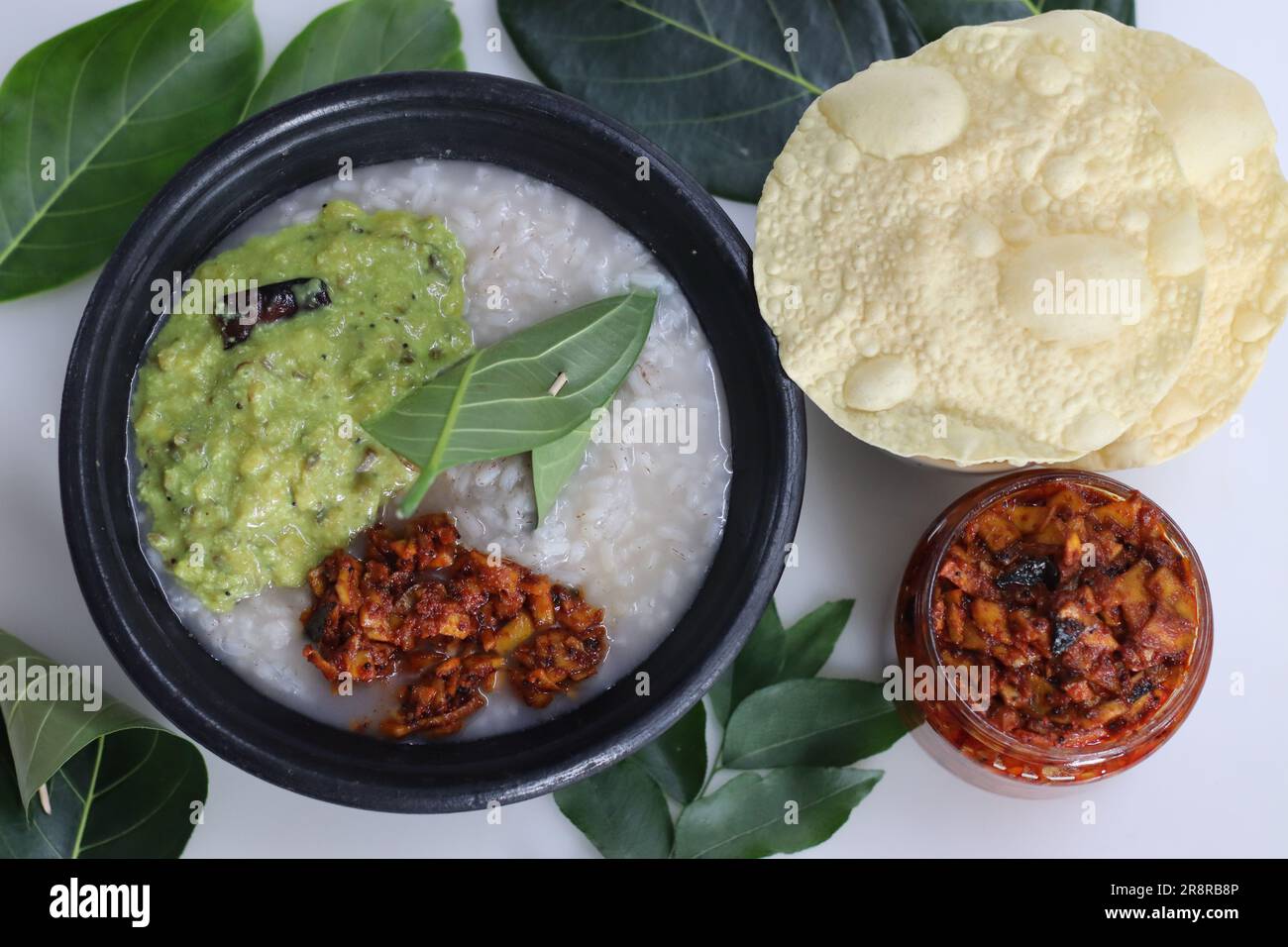 Kanji and Kadumanga. Rice gruel prepared with Kerala Matta rice. Served ...