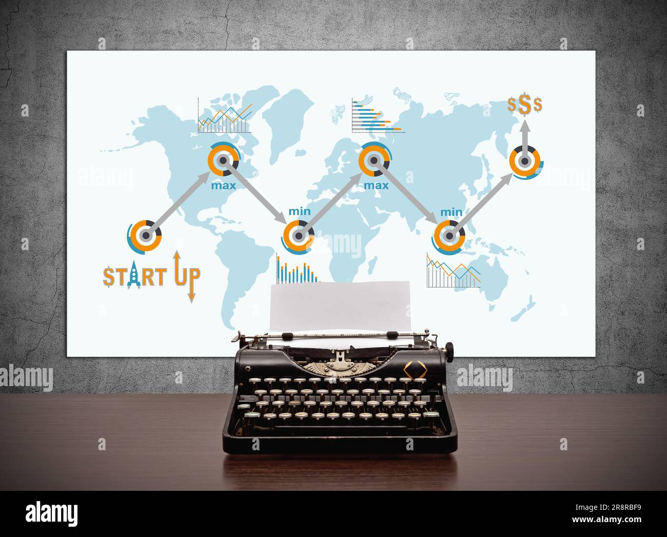 Vintage typewriter on table and drawing start up chart on placard Stock ...