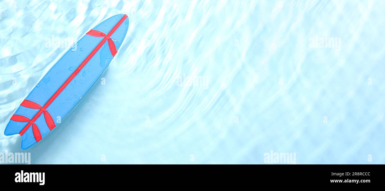 Blue surfboard on water surface, top view. Banner for design Stock ...