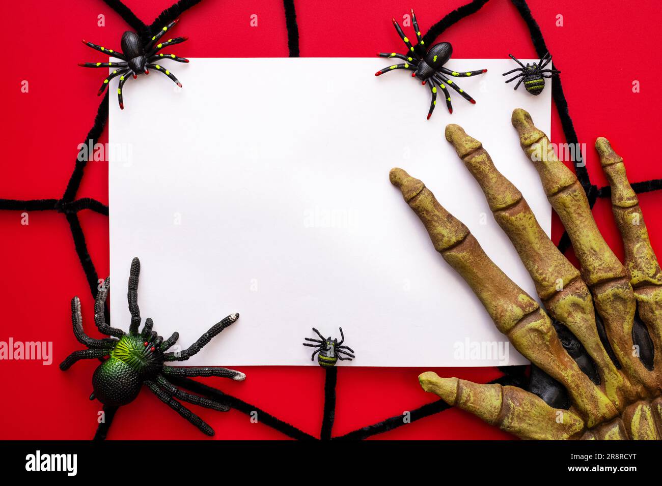 Halloween mock up, blank sheet of paper with spiders, web and monsters ...