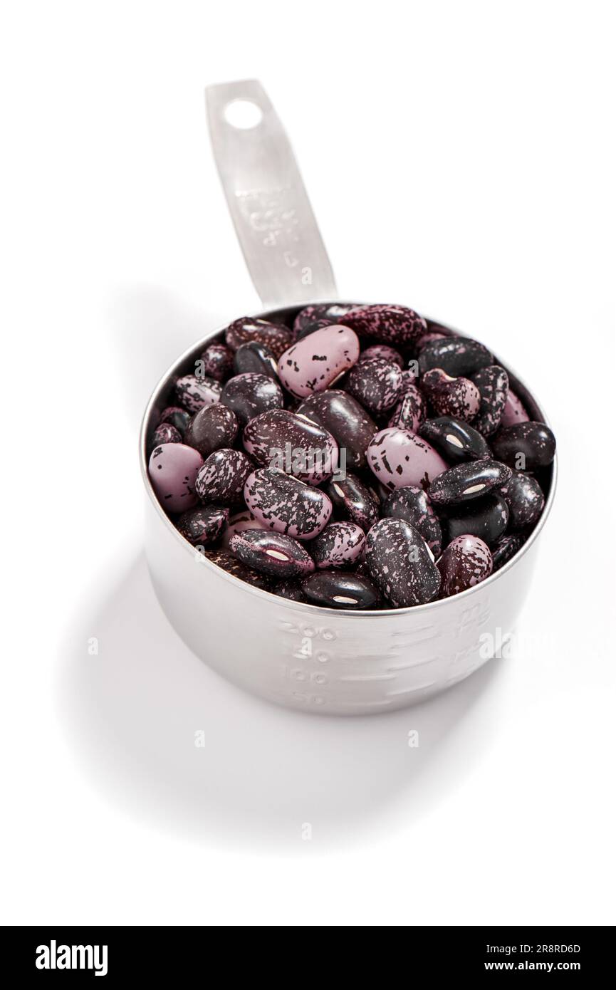 Kidney beans in a measuring cup, white background Stock Photo - Alamy