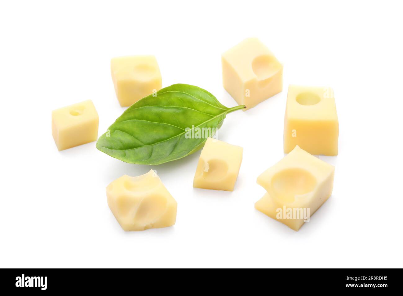 Cubes of tasty Swiss cheese isolated on white background Stock Photo ...