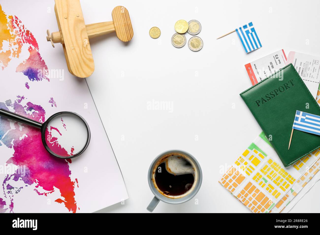 Frame made of Greek flag, world map, passport and wooden plane isolated ...