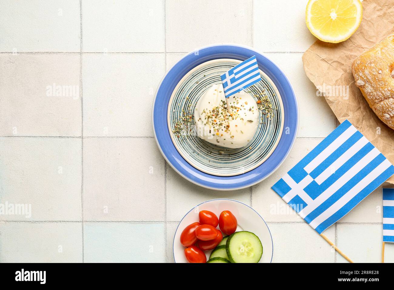Flags of Greece and different food on tiled table Stock Photo - Alamy