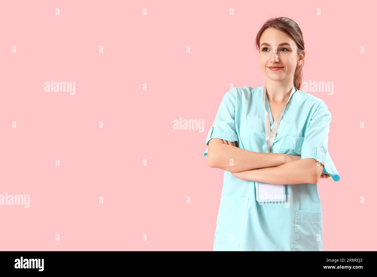 Female medical intern on pink background Stock Photo - Alamy