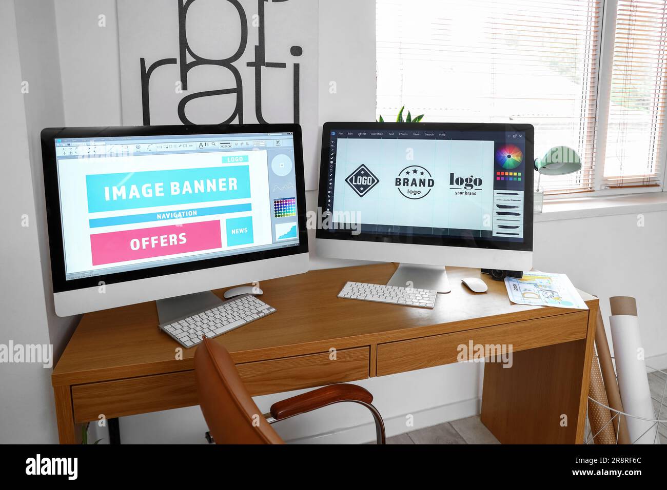Graphic designer's workplace with computer monitors in office Stock ...