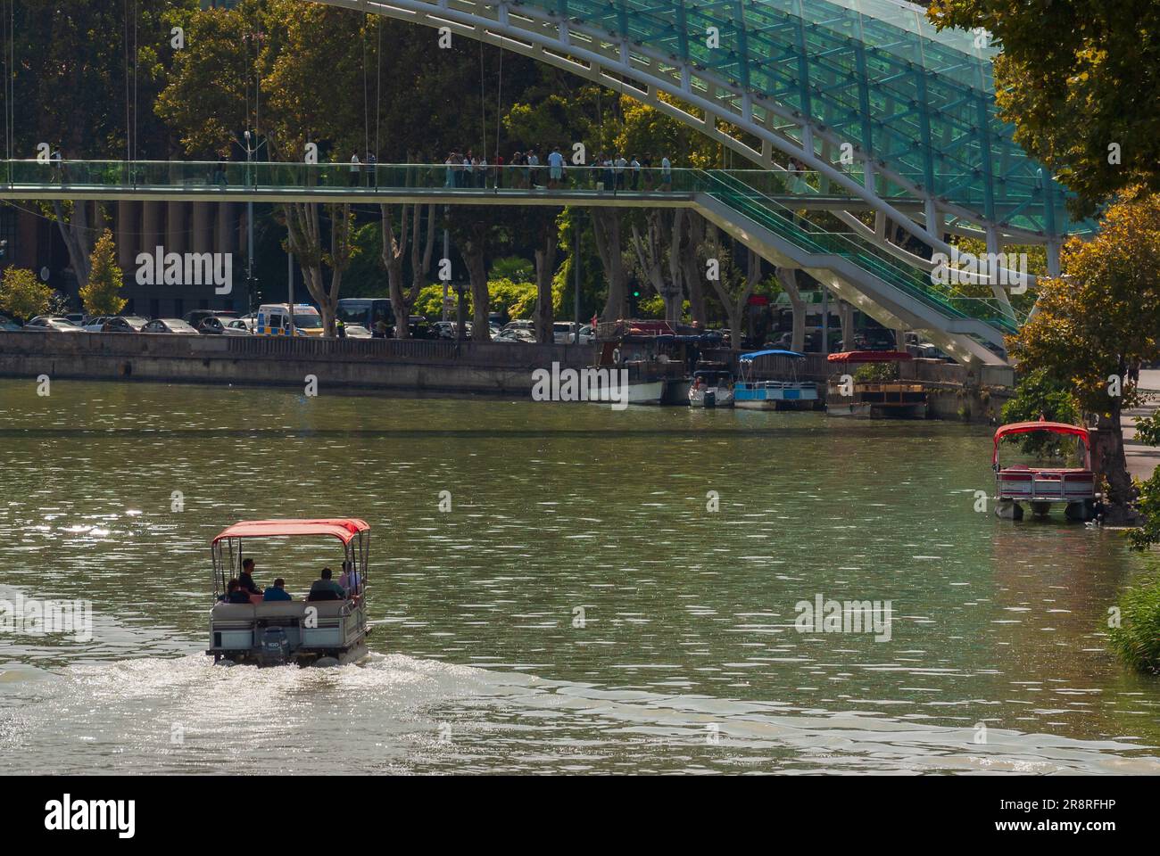 Georgia, Tbilisi - September 17, 2022: Tourists ride on a pleasure boat ...