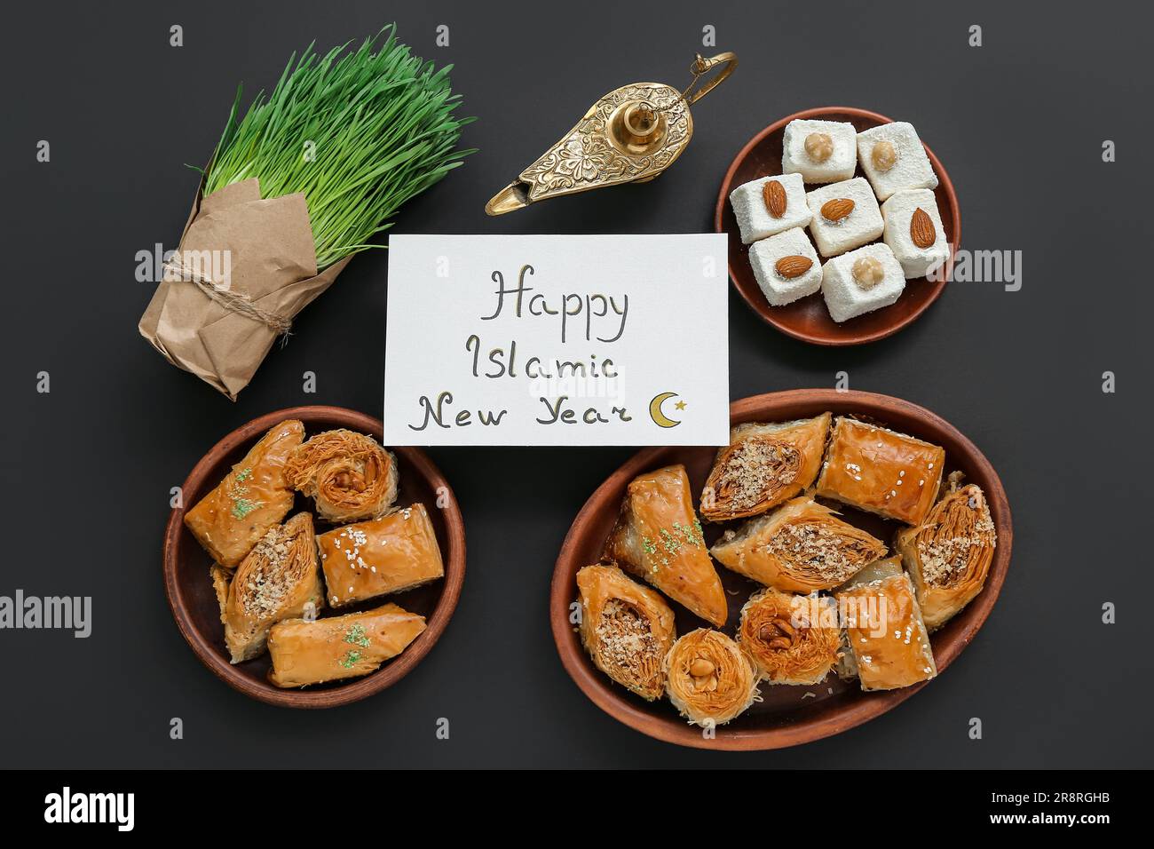 Card with text HAPPY ISLAMIC NEW YEAR, Aladdin lamp, grass and sweets ...