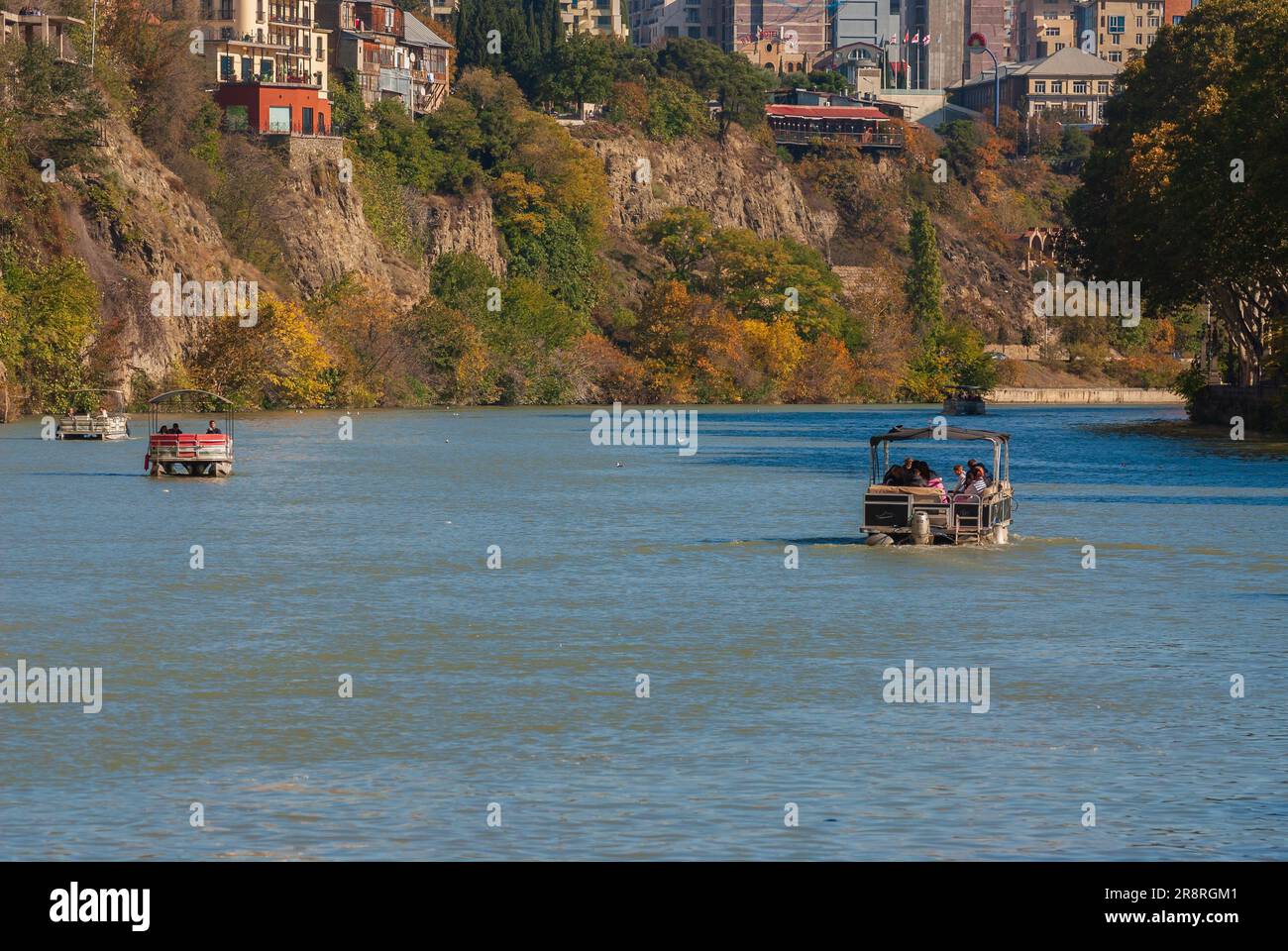 Georgia, Tbilisi - October 30, 2022: Tourists ride on a pleasure boat ...