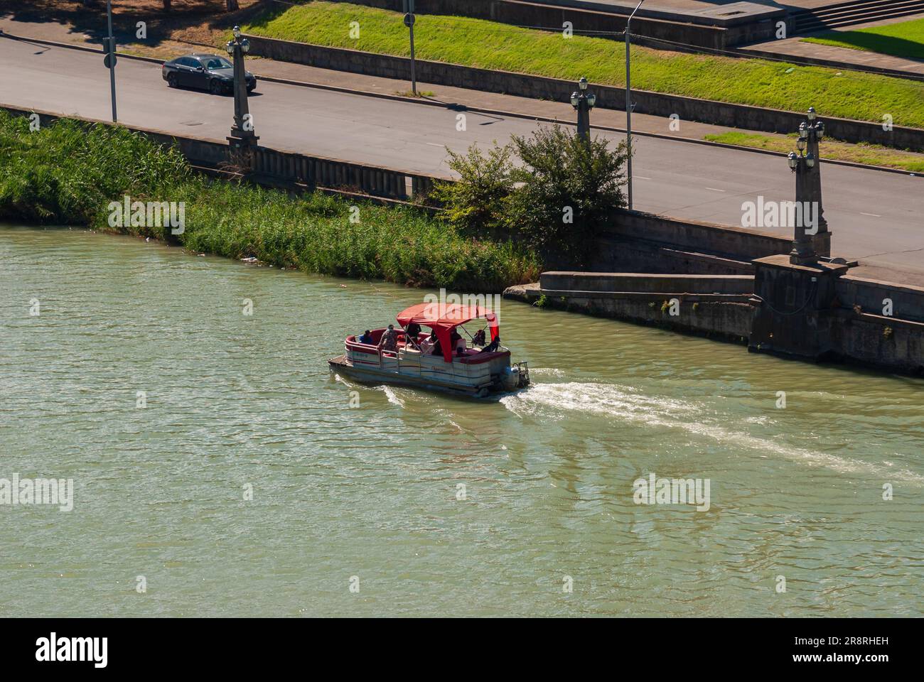 Georgia, Tbilisi - September 25, 2022: Tourists ride on a pleasure boat ...