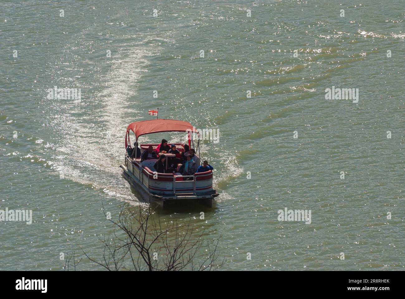 Georgia, Tbilisi - September 25, 2022: Tourists ride on a pleasure boat ...