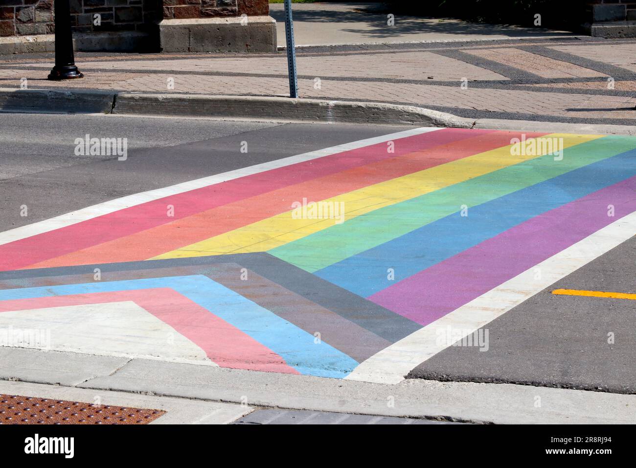 Pride Rainbow LGBT Sidewalk Crosswalk on city road Stock Photo - Alamy