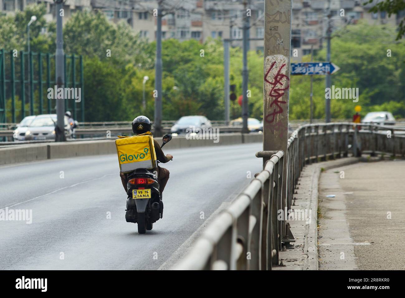 Bucharest, Romania - 22nd June, 2023: A Glovo food delivery courier ...