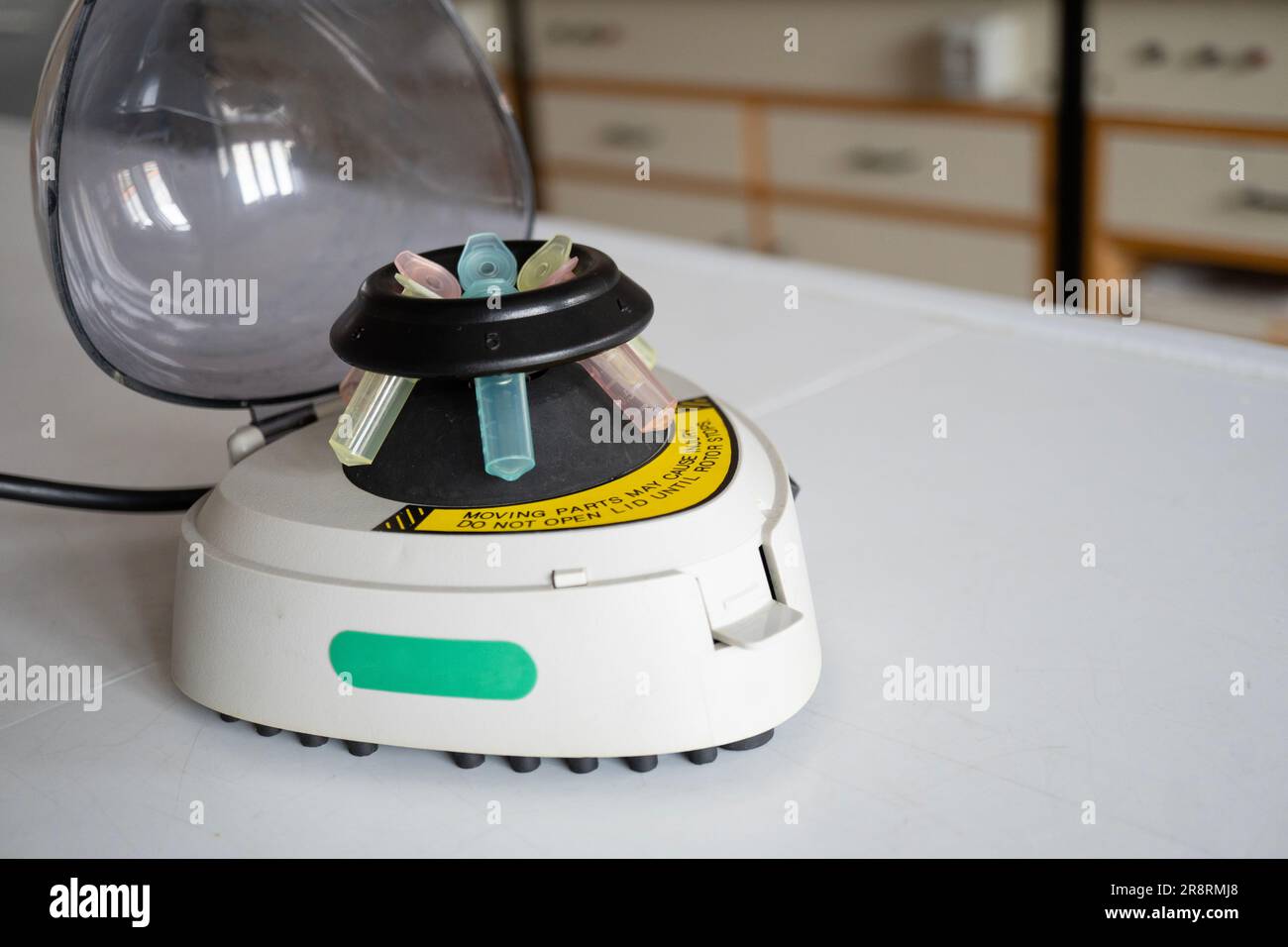 Microtube centrifuge for genetic testing in laboratory Stock Photo - Alamy