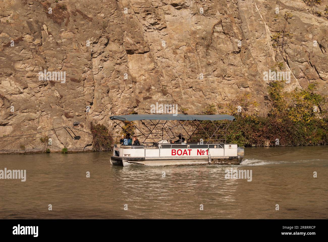 Georgia, Tbilisi - October 30, 2022: Tourists ride on a pleasure boat ...