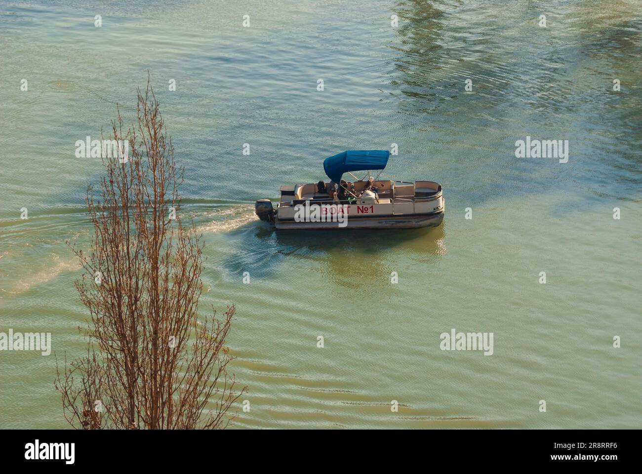 Georgia, Tbilisi - December 30, 2021: Tourists ride on a pleasure boat ...