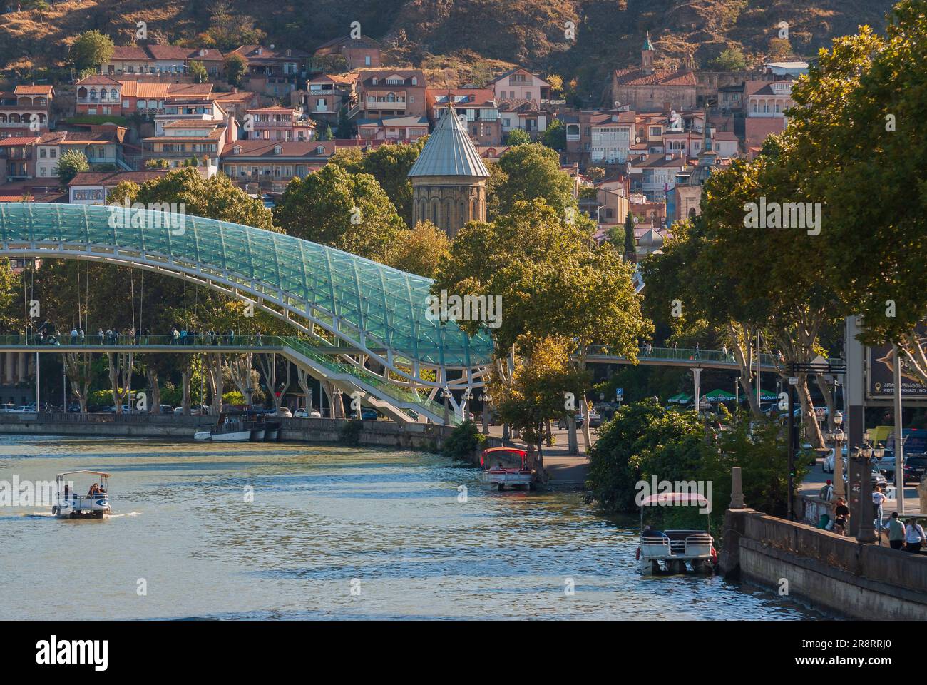 Georgia, Tbilisi - September 25, 2022: Tourists ride on a pleasure boat ...