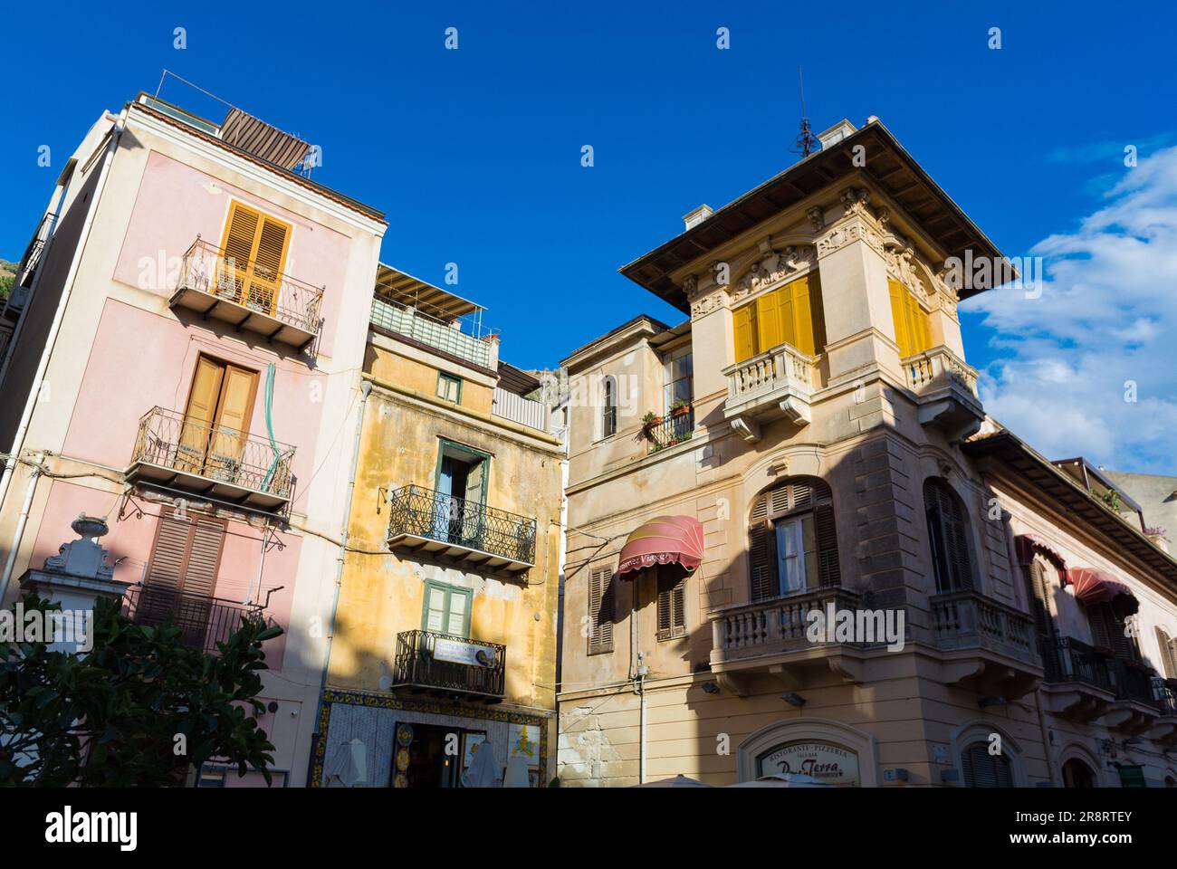 Cefalu, Sicily, Italy, A cityscape of Cefalu with old buildings in a ...