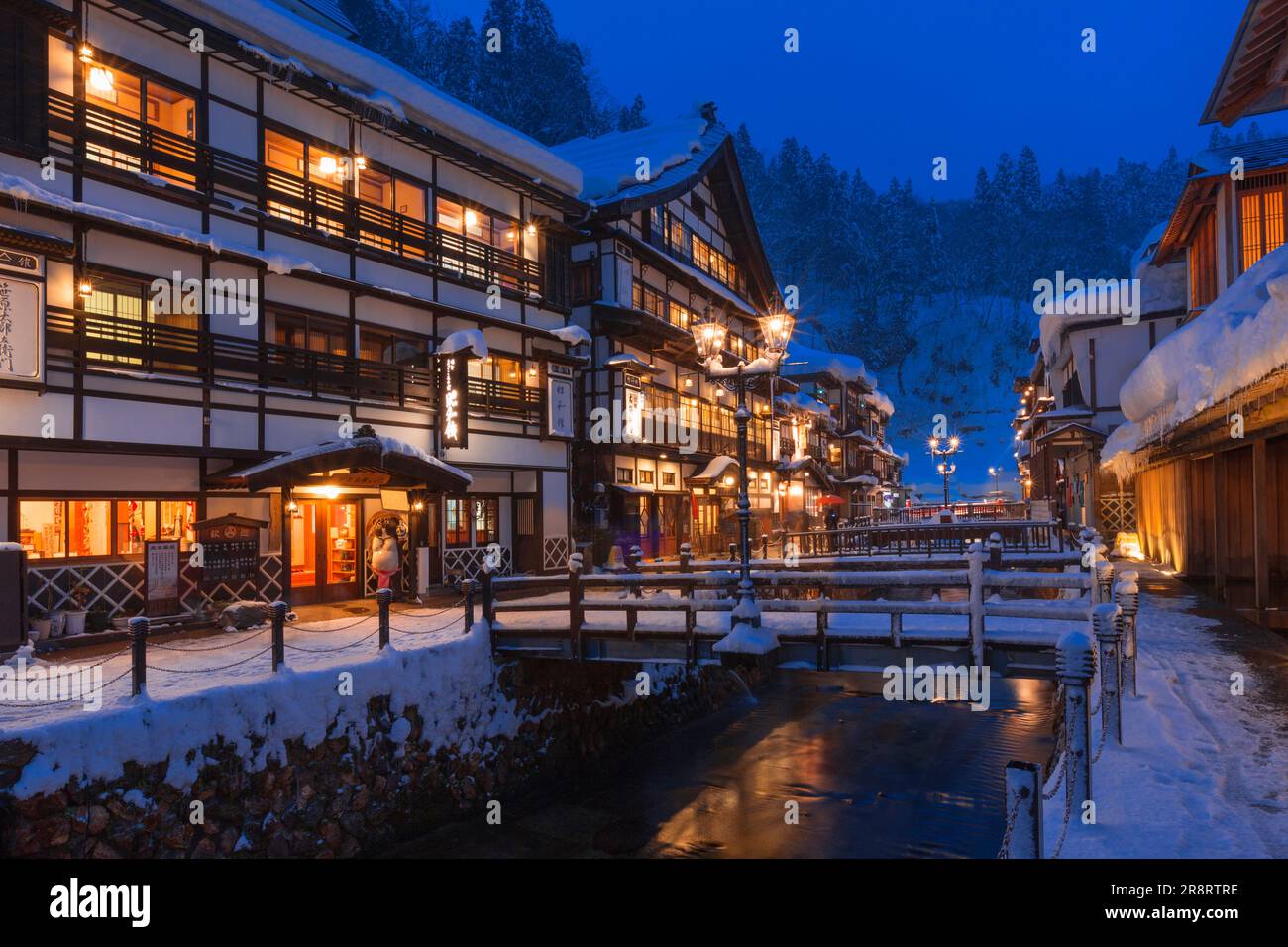 Evening view of snowy Ginzan Onsen hot spring Stock Photo - Alamy