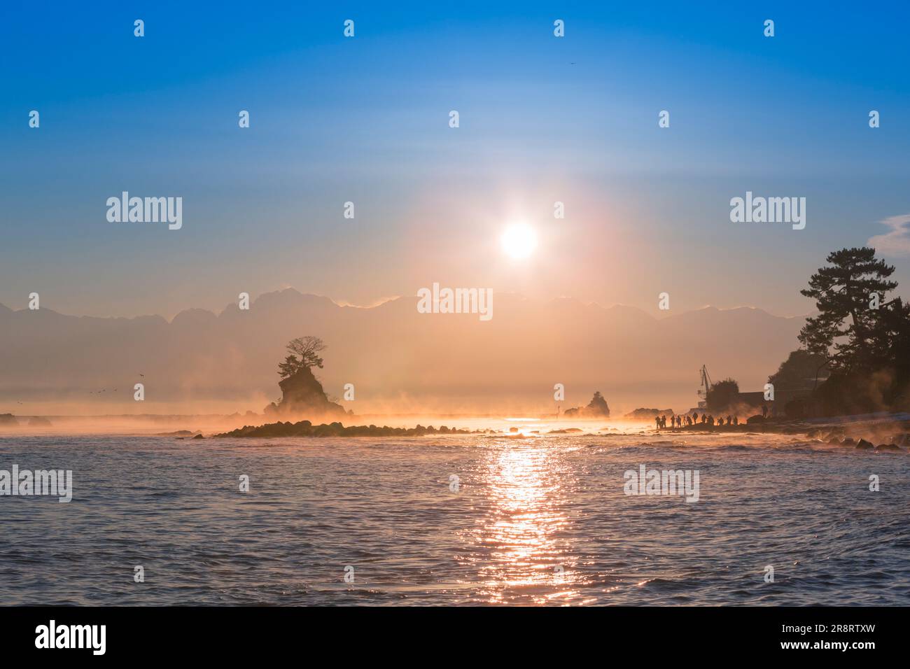 The morning sun of Amaharashi coast and Tateyama mountain range Stock ...