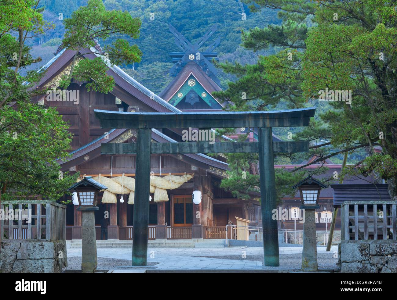 Main shrine and hall of worship and copper torii of Izumo Taisha Stock ...