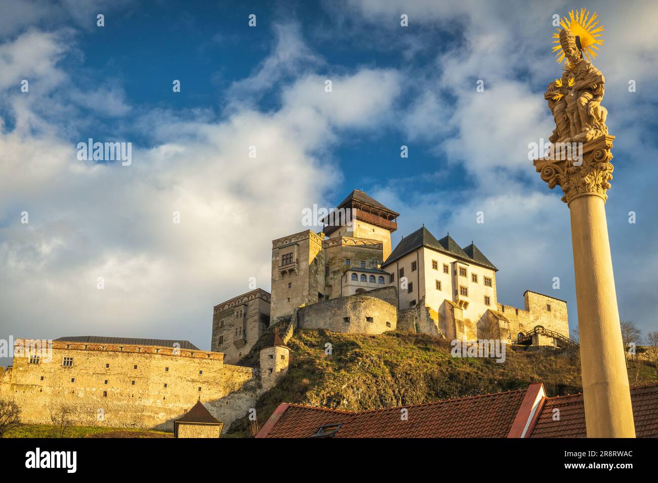 The Trencin Castle above the town of Trencin at sunset, Slovakia ...