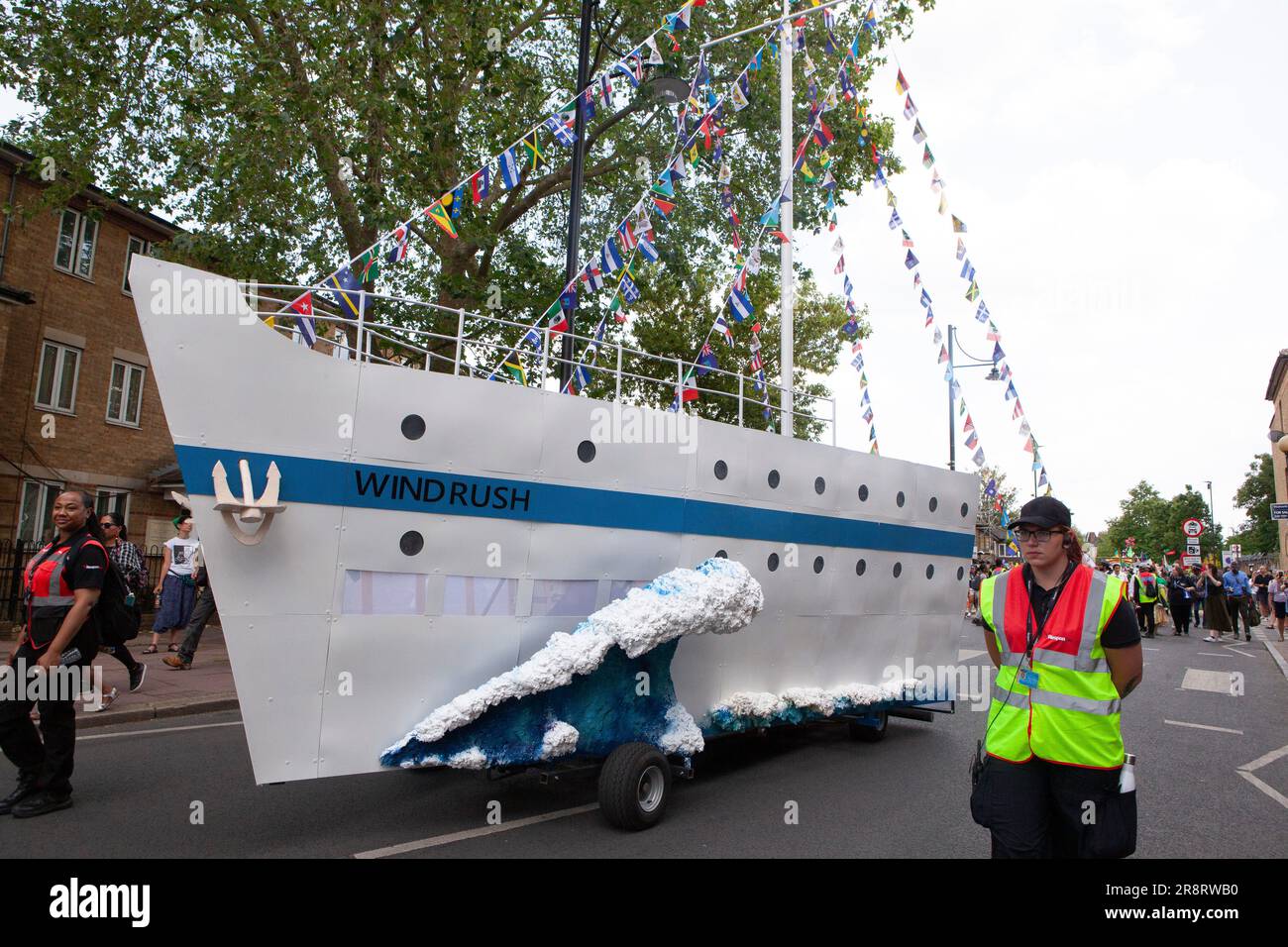 London, UK. 23rd June, 2023. A procession through Brixton, along ...