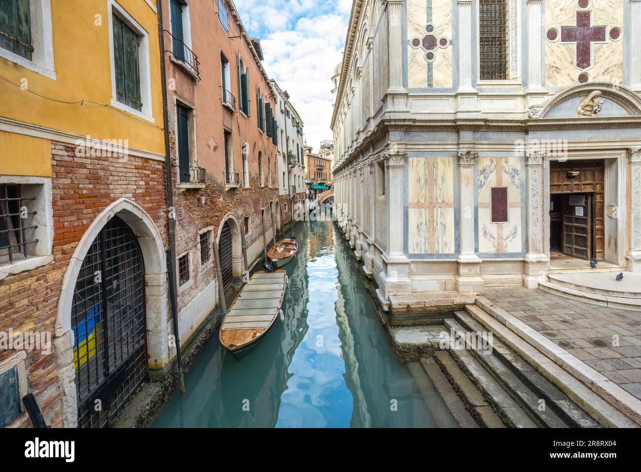 The canal in Venice near the Church of Saint Mary of Miracles, Italy ...