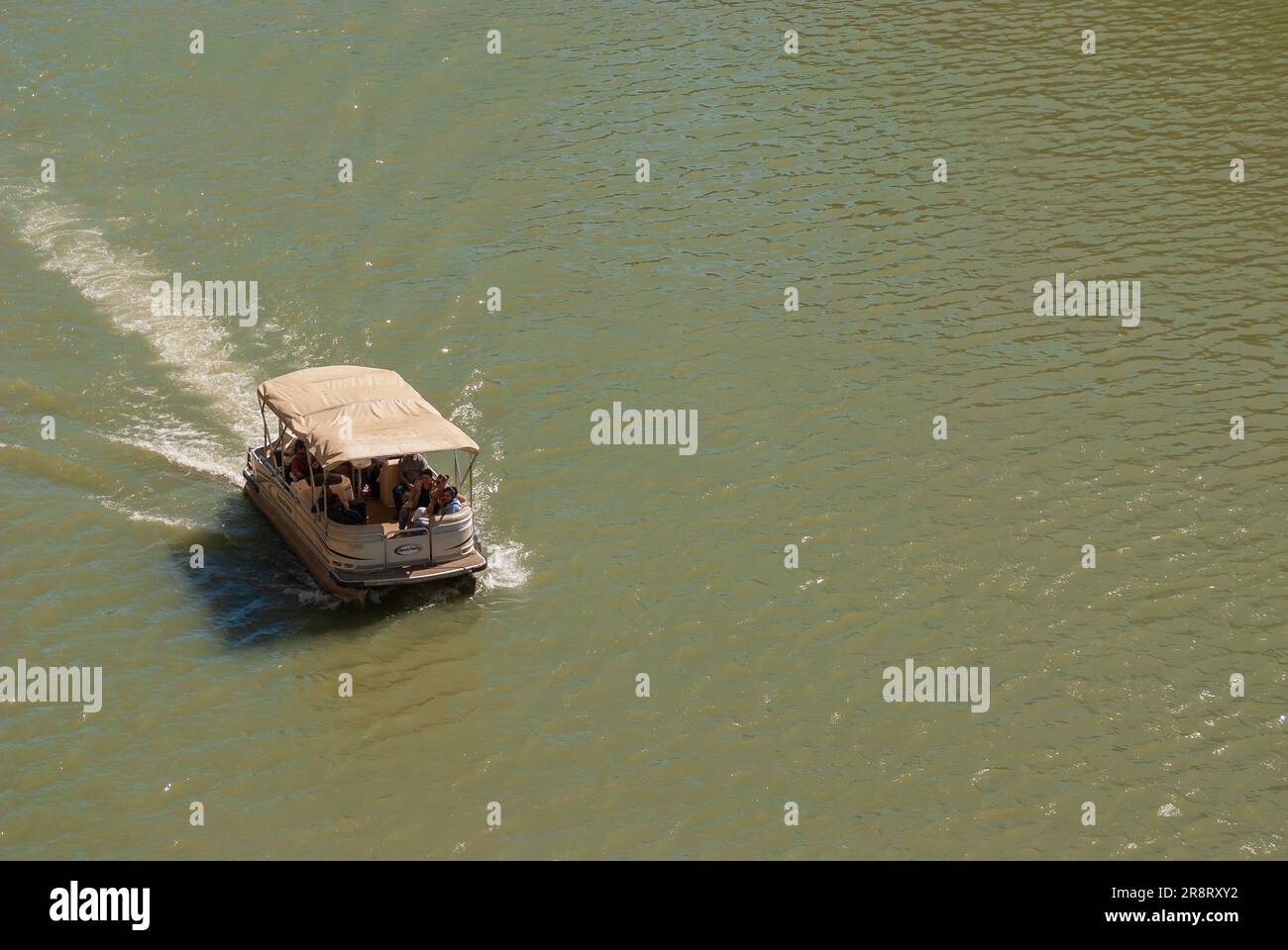 Georgia, Tbilisi - September 25, 2022: Tourists ride on a pleasure boat ...