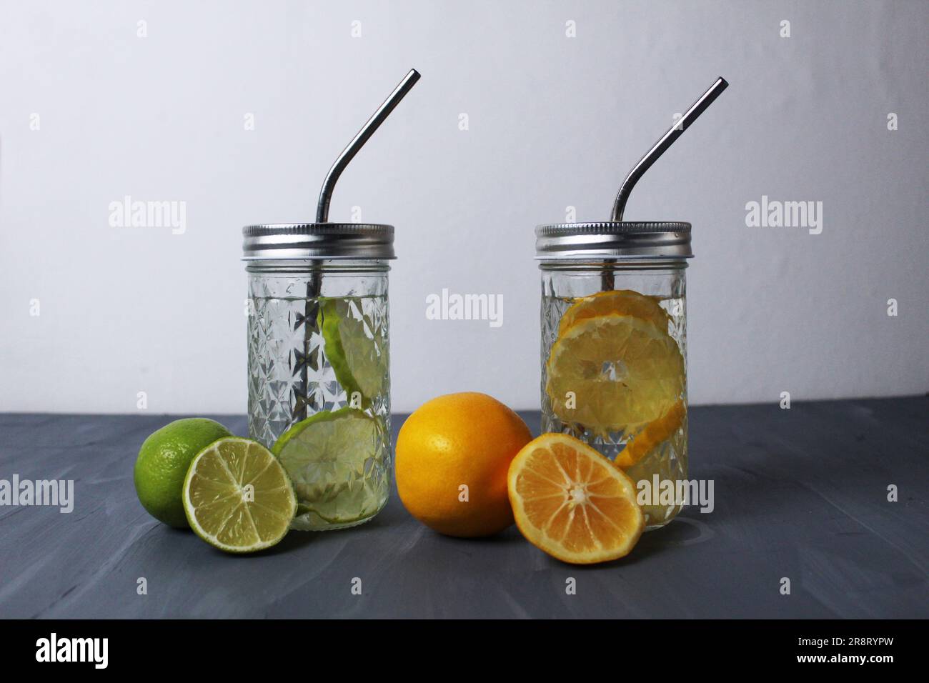 lemonade made from citrus fruits, orange and lime in glasses with a ...