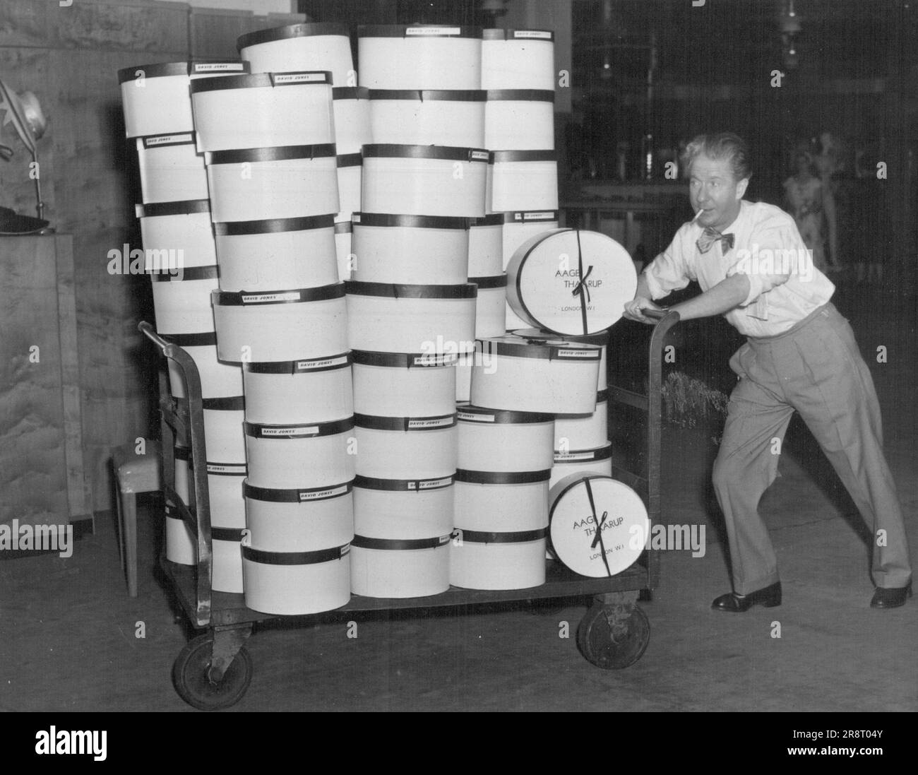 In Sydney he worked at top pressure to prepare his showing of hats ...