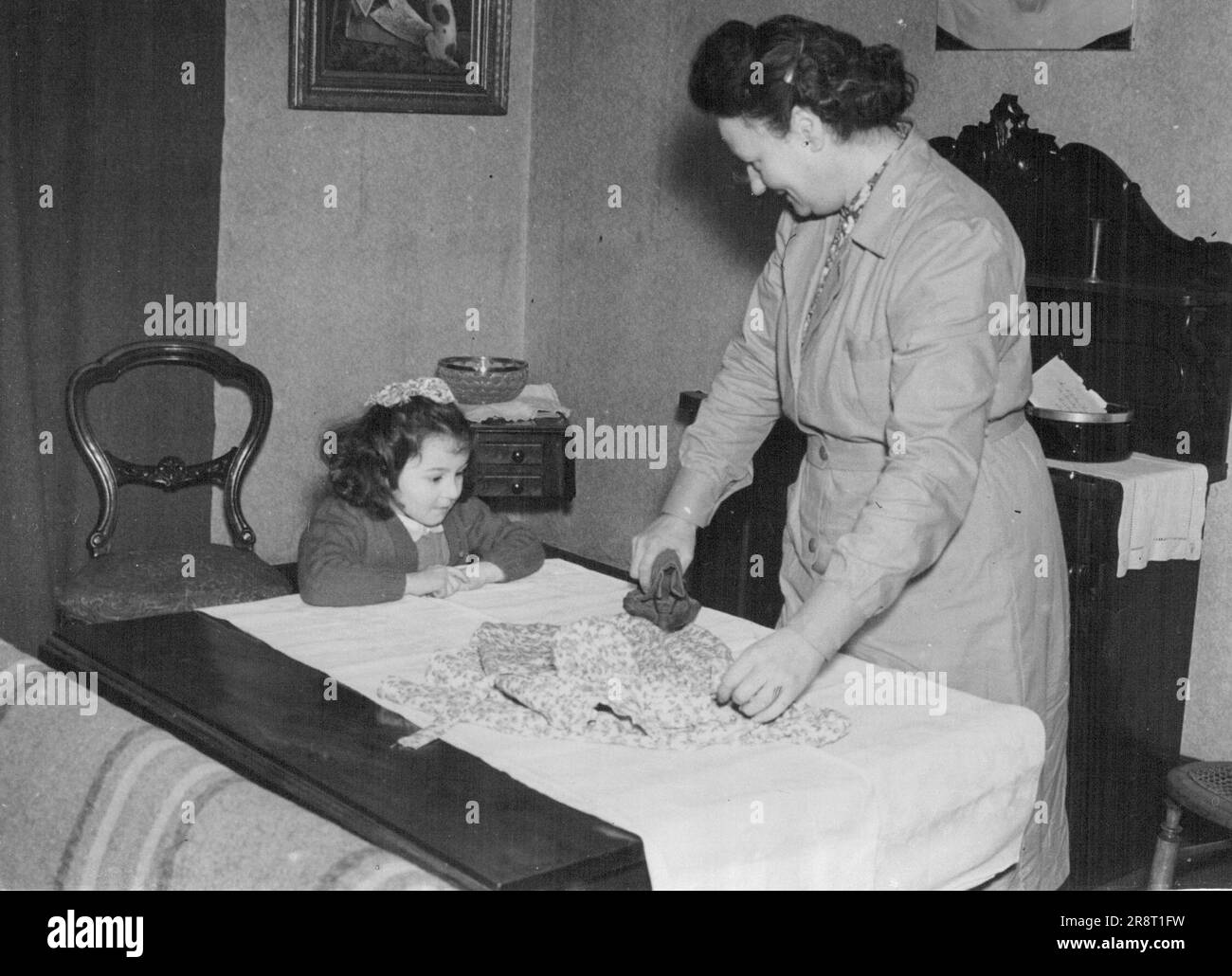 Tania Prepares To Go To The Palace -- Tania watches Mrs. Bushell, her ...