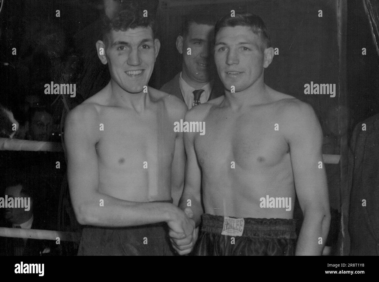 Weigh - In For Title Fight -- Henry Hall (left) and Eddie Thomas shake ...