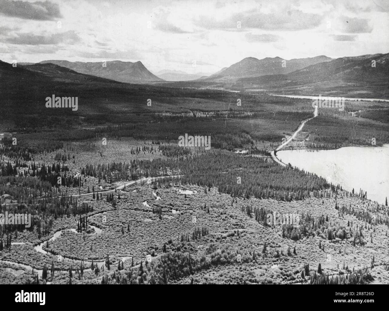 U.S. Highway To Alaska -- Through bushland and forest, across muskeg ...