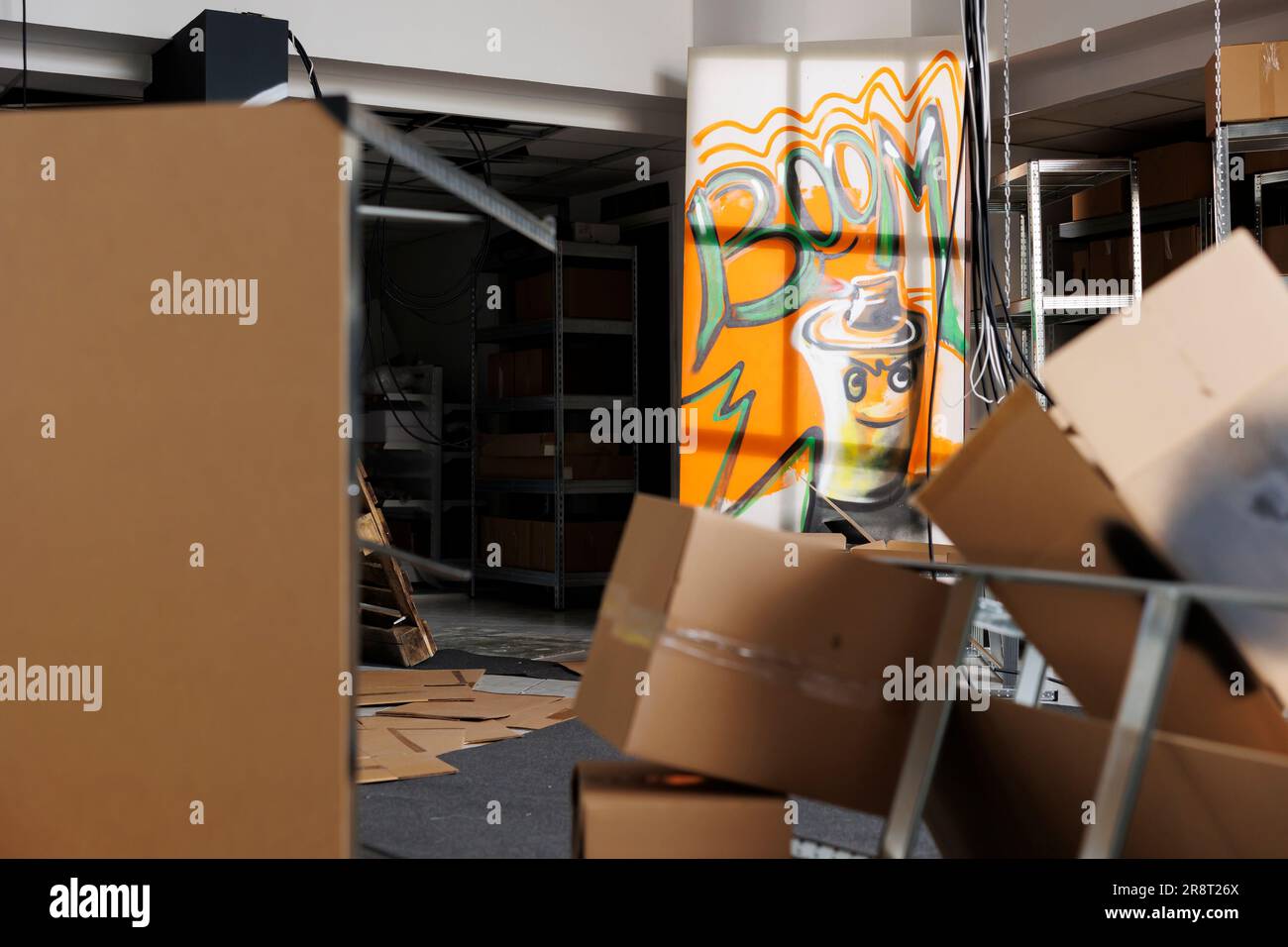 Old decaying structure covered in rusty graffiti artwork with garbage ...