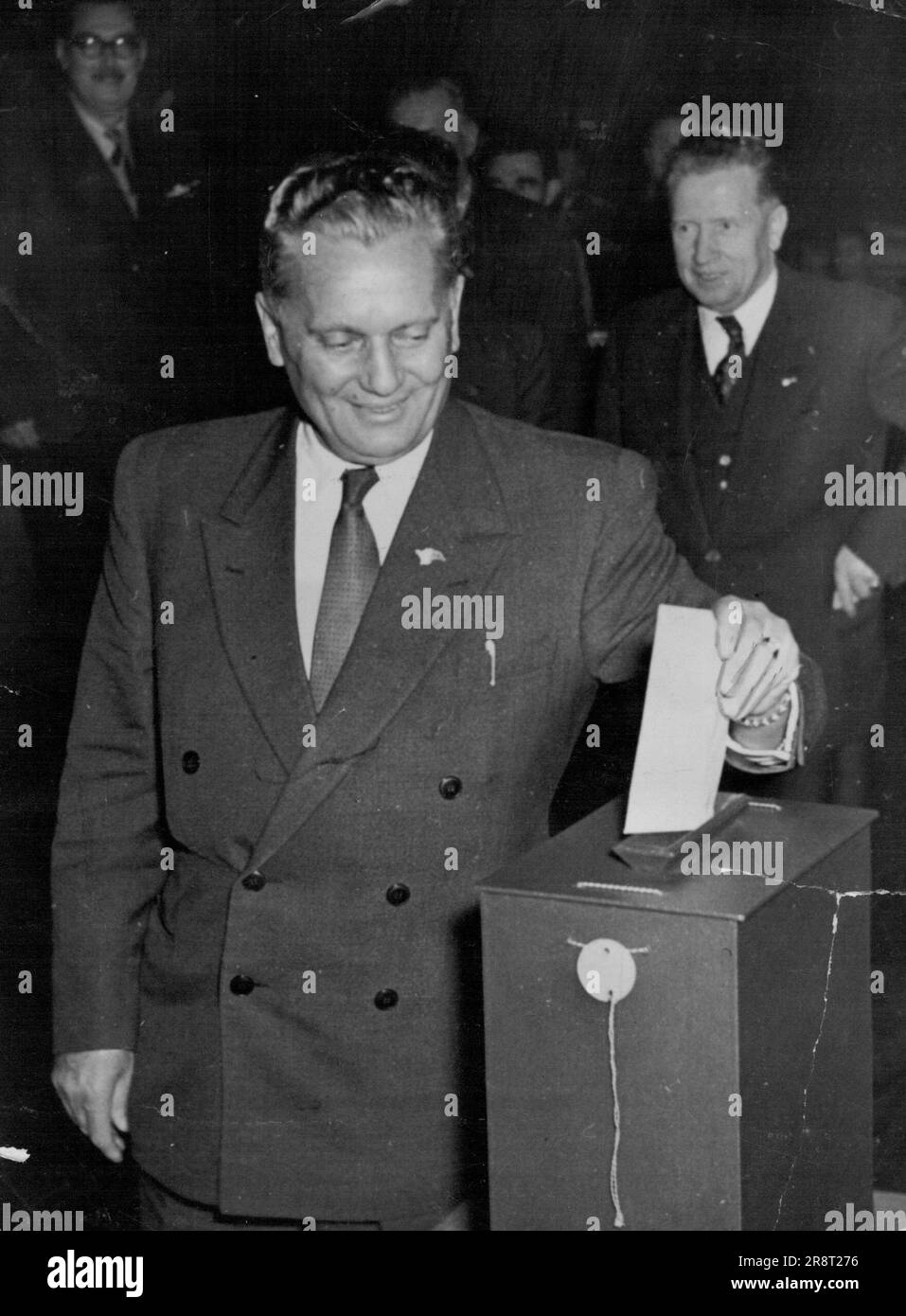 Marshal Tito, Yugoslav Chief of State, drops his paper into the box ...