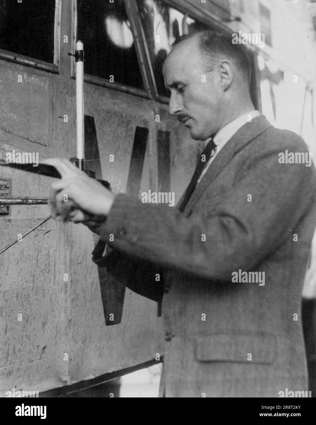 Capt Taylor looking for the *****. May 13, 1935 Stock Photo - Alamy