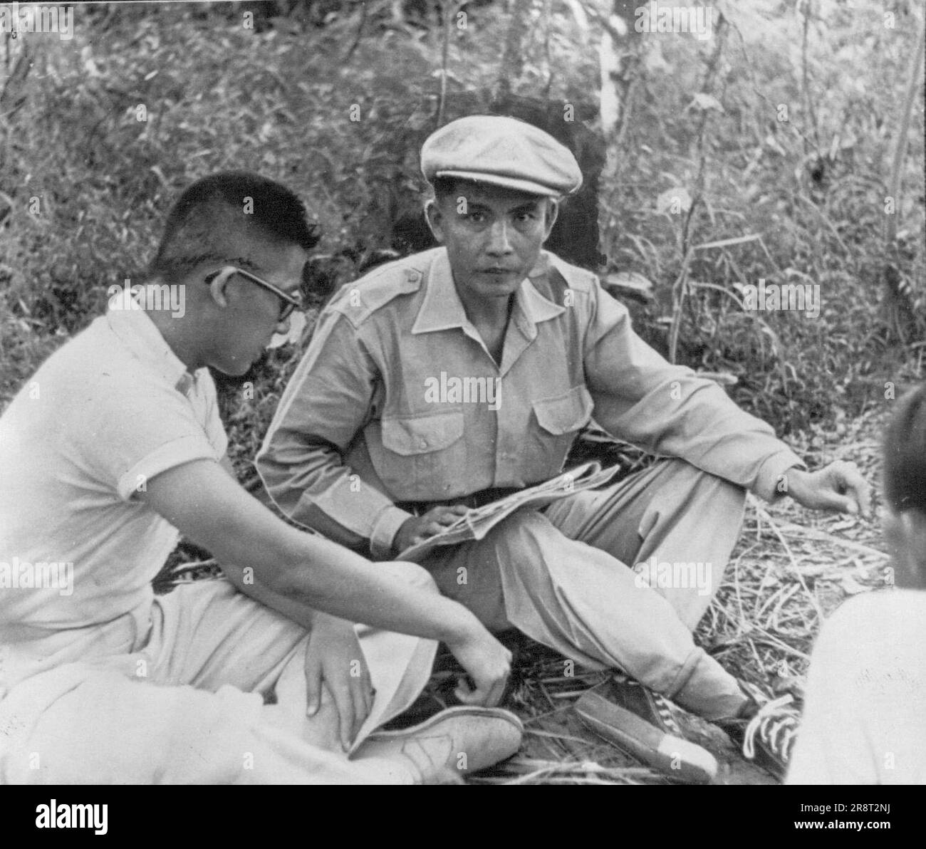 Says Wiling To Cooperate -- Luis M. Taruc, 40, right Philippine ...