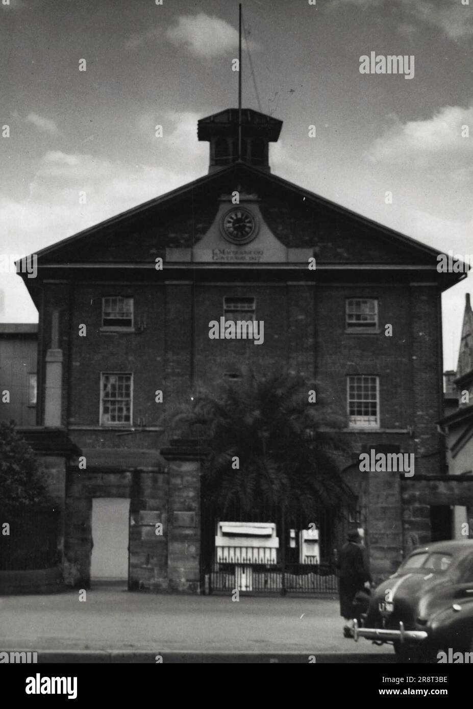 Historic barracks (top) facing used as a courthouse. March 31, 1946 ...