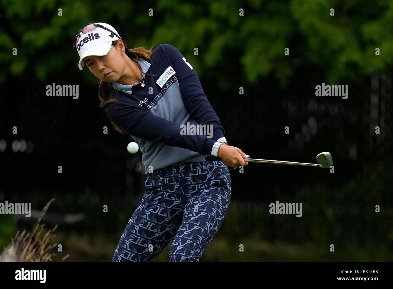 Jenny Shin chips onto the ninth green during the first round of the ...