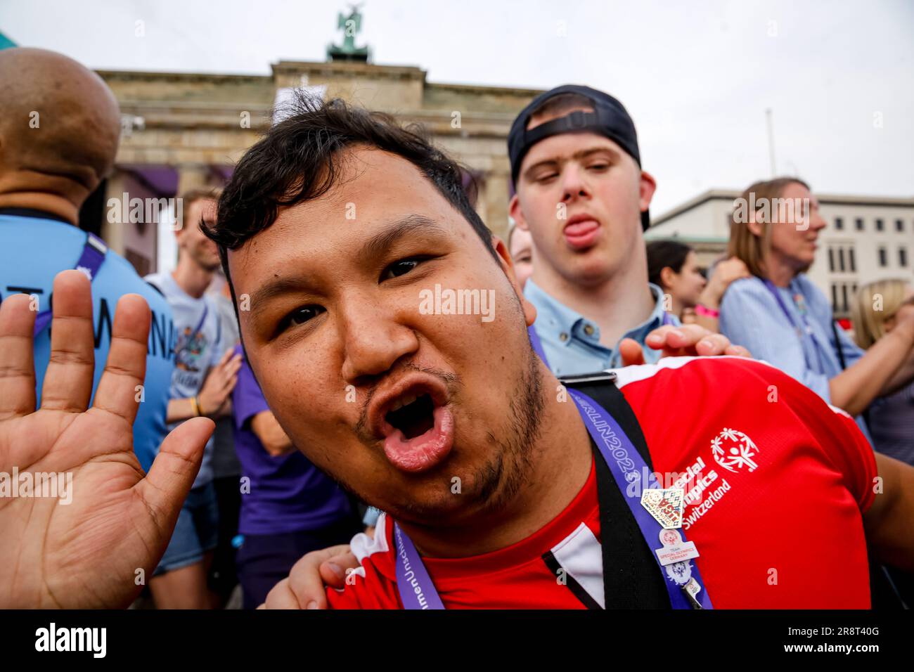 Participants enjoy the street party for athletes and supporters of the ...