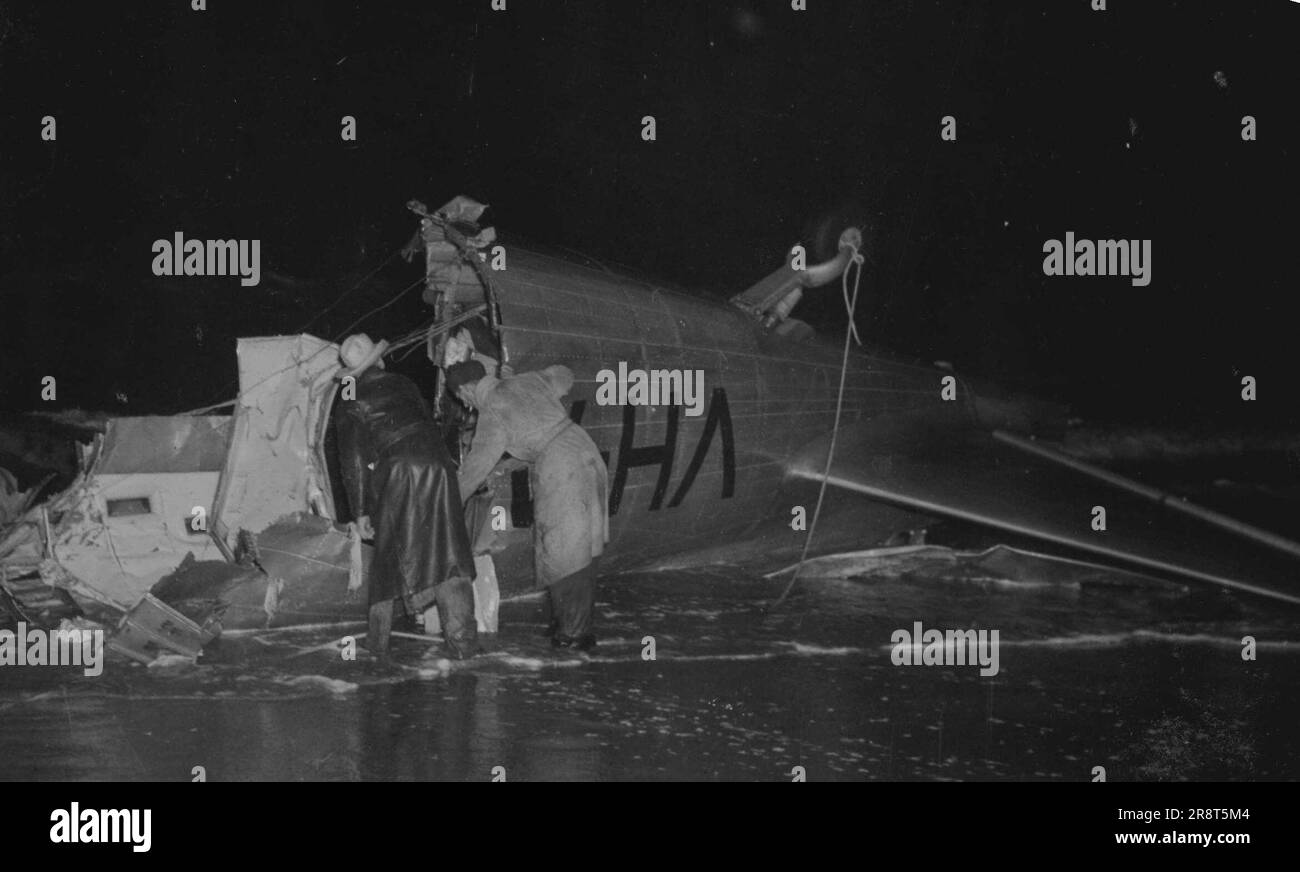 Smashed tail unit of the Australian National Airways Douglas airliner ...
