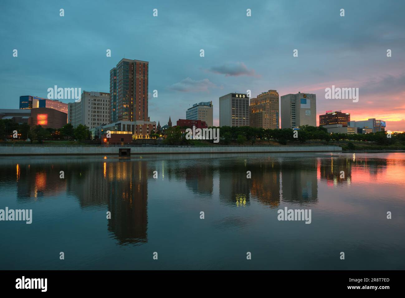 View of the Newark skyline and the Passaic River at sunset, New Jersey ...