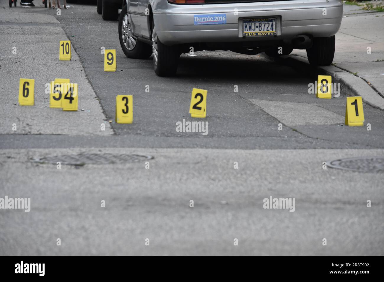 Evidence markers from the Philadelphia police crime scene unit mark ...