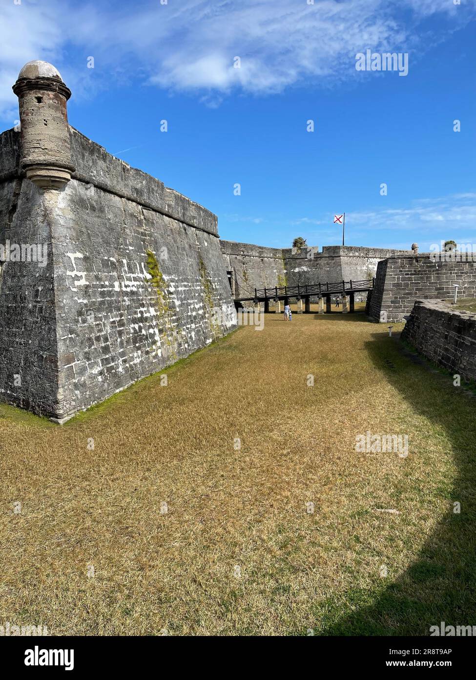 A scenic view of an expansive stone wall of the Castillo de San Marcos ...