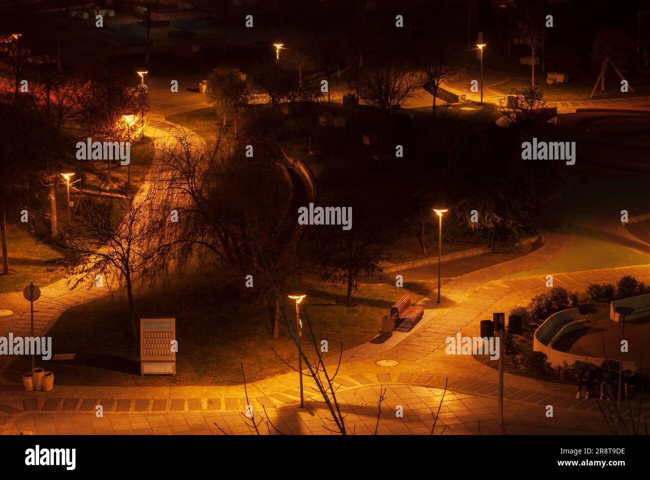 View of empty city park at night with no people Stock Photo - Alamy