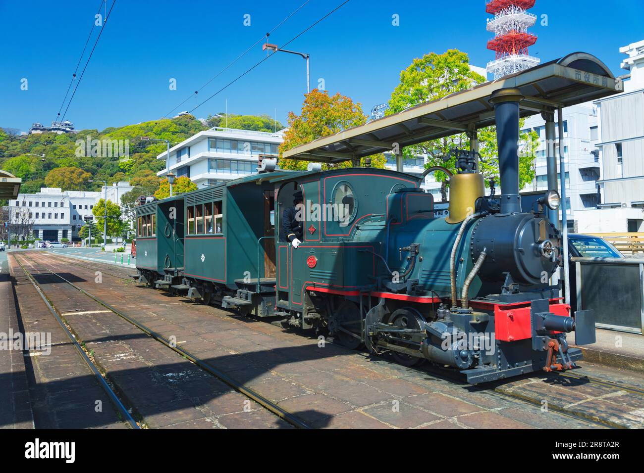 Bo-chan Train and Matsuyama Castle Stock Photo - Alamy