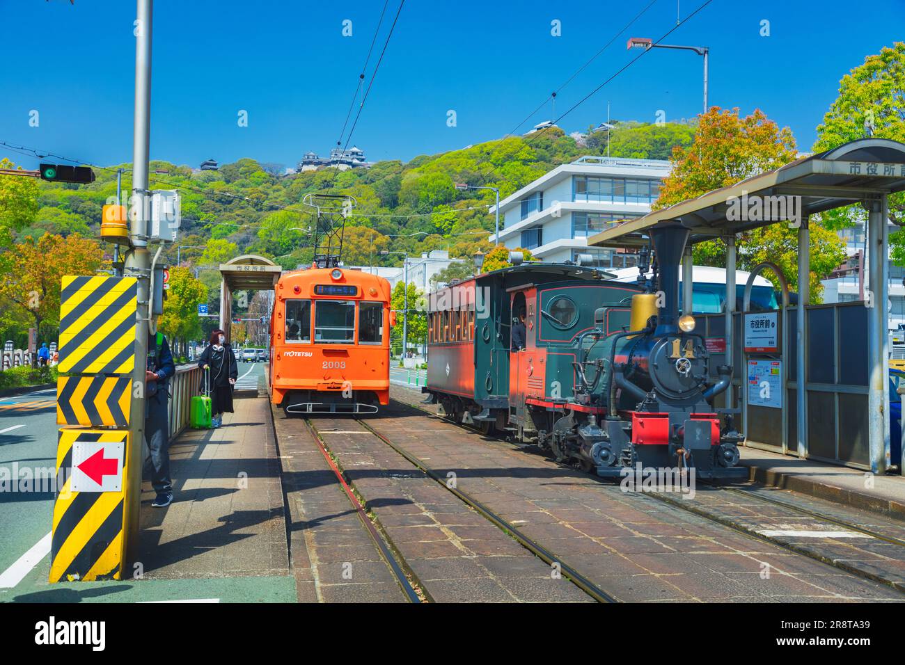 Bo-chan Train and Matsuyama Castle Stock Photo - Alamy
